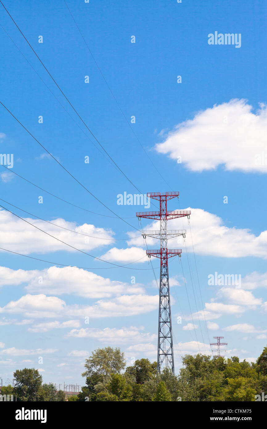 Electric power transmission through river Stock Photo - Alamy