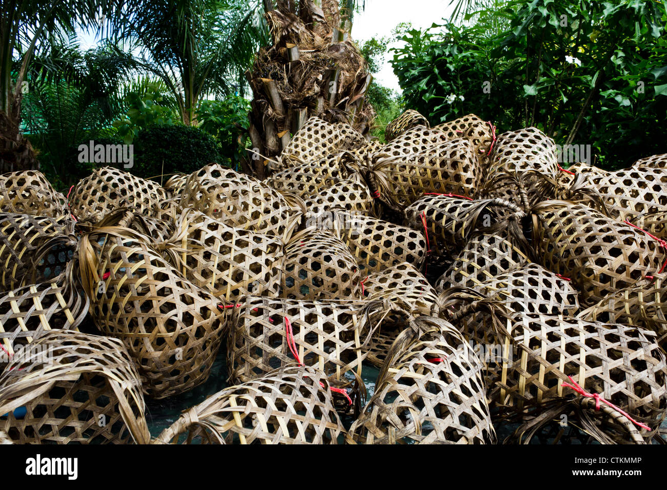 A Pile of Bamboo Baskets on the Ground Stock Photo - Alamy