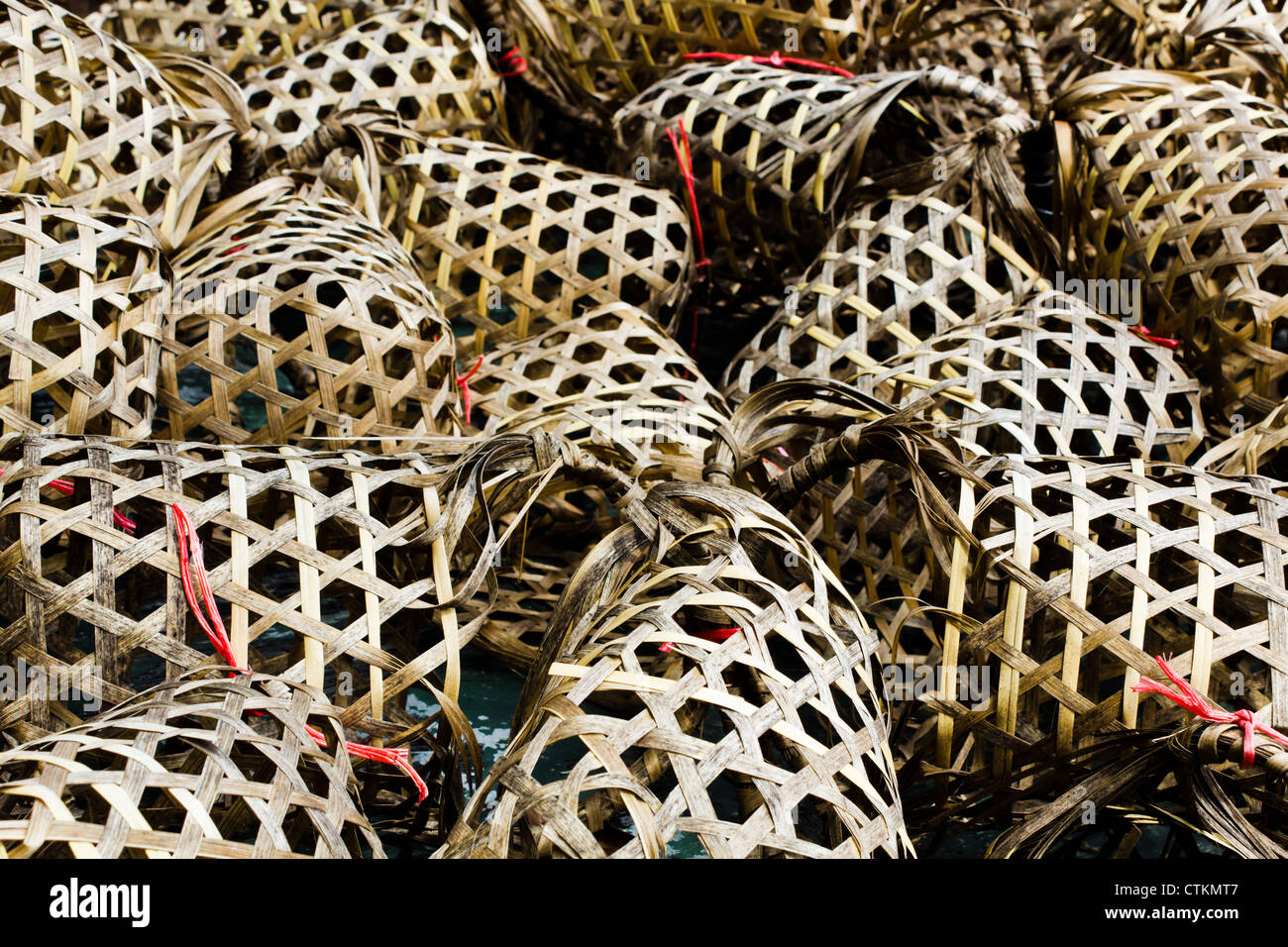 A Pile of Bamboo Baskets on the Ground Stock Photo - Alamy