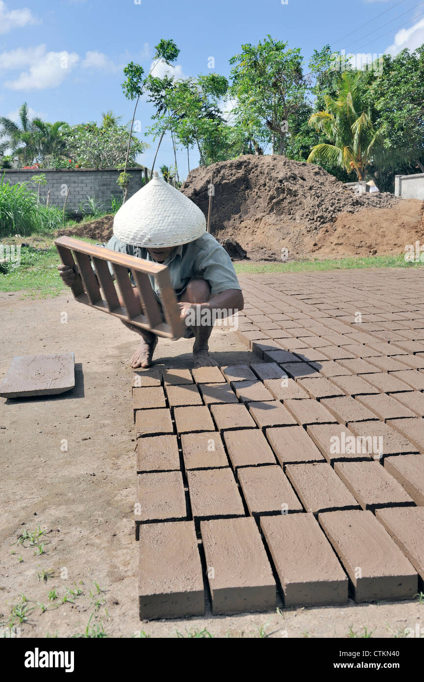 Man making mud bricks hi-res stock photography and images - Alamy
