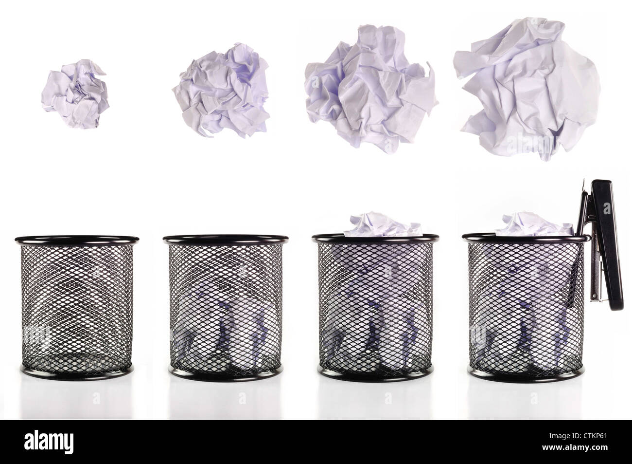 Trash can full of paper And collection of various balls Stock Photo - Alamy