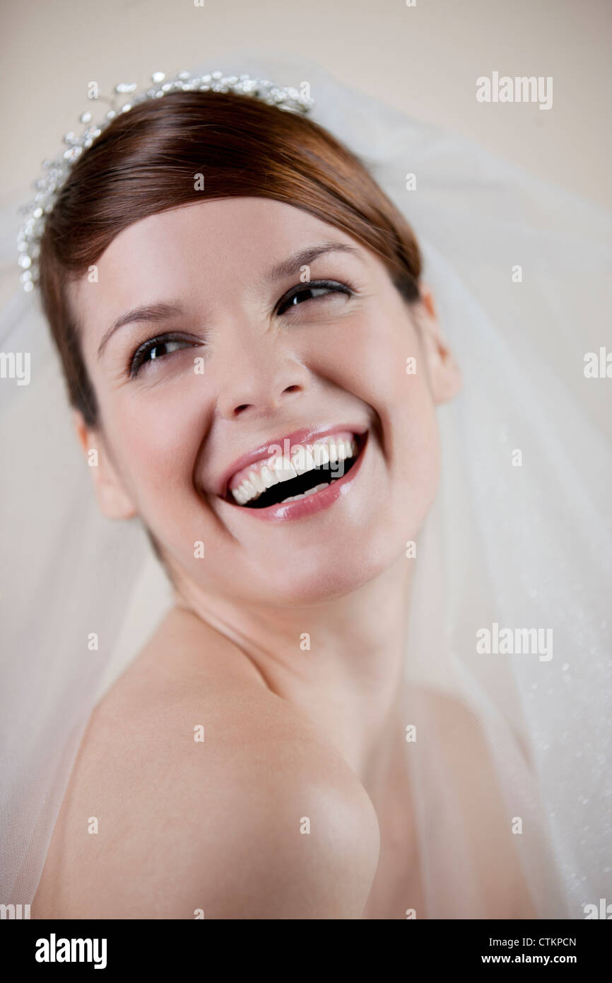 A young bride laughing Stock Photo - Alamy