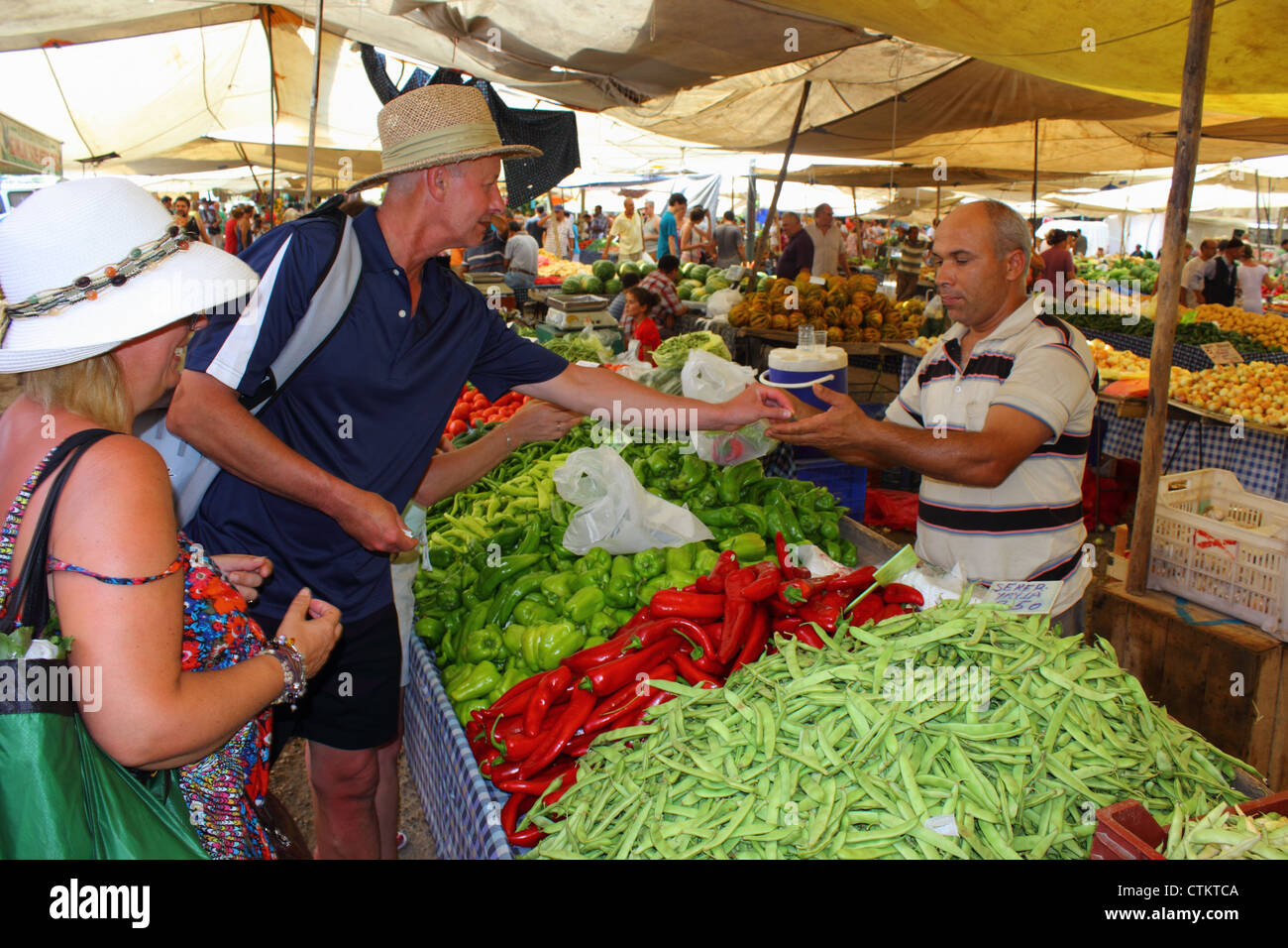 Buying Fresh market produce Stock Photo - Alamy