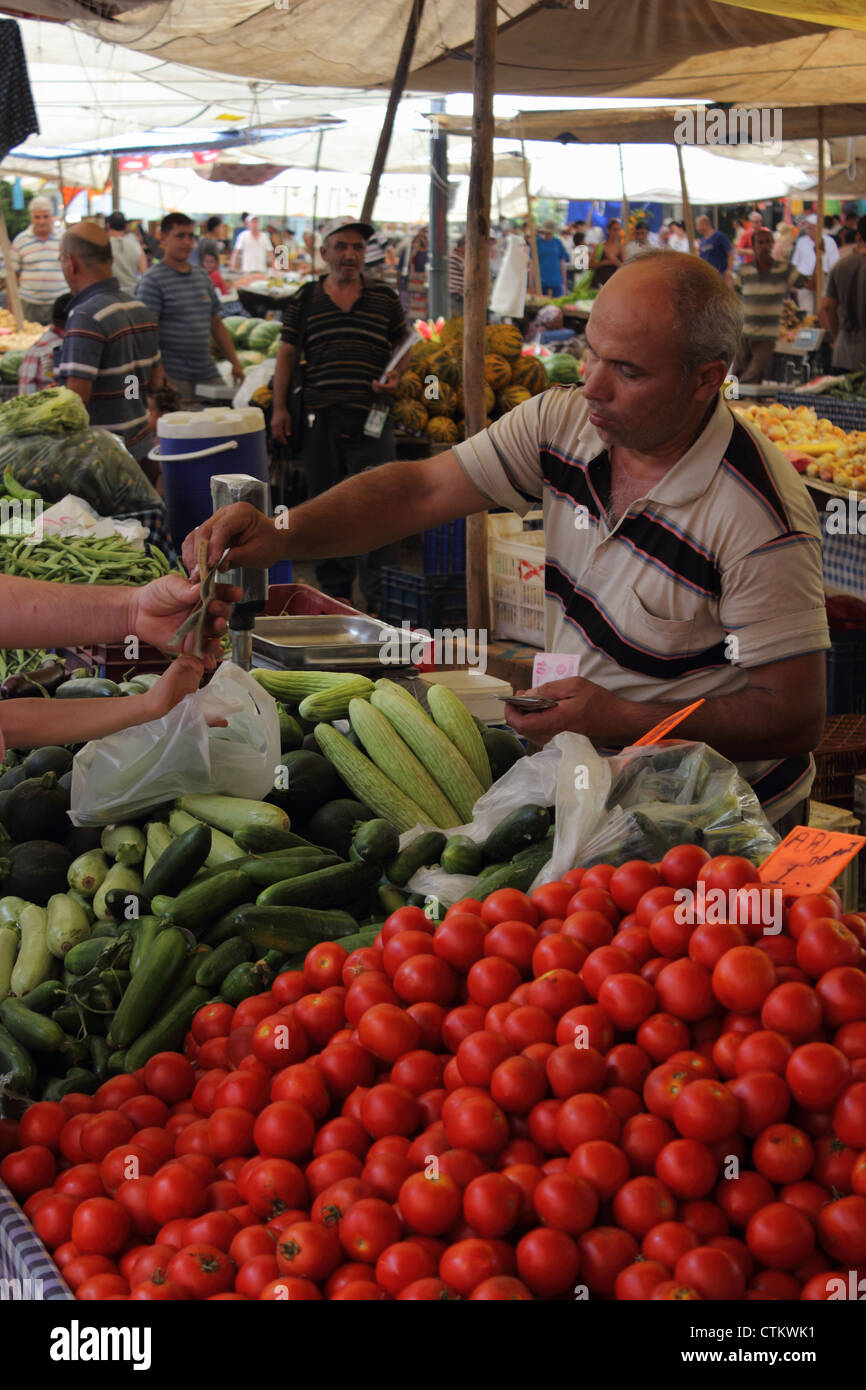 Buying Fresh market produce Stock Photo - Alamy