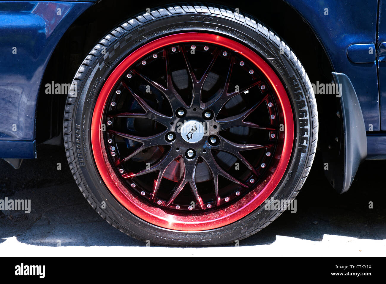 Red mag wheel Stock Photo - Alamy
