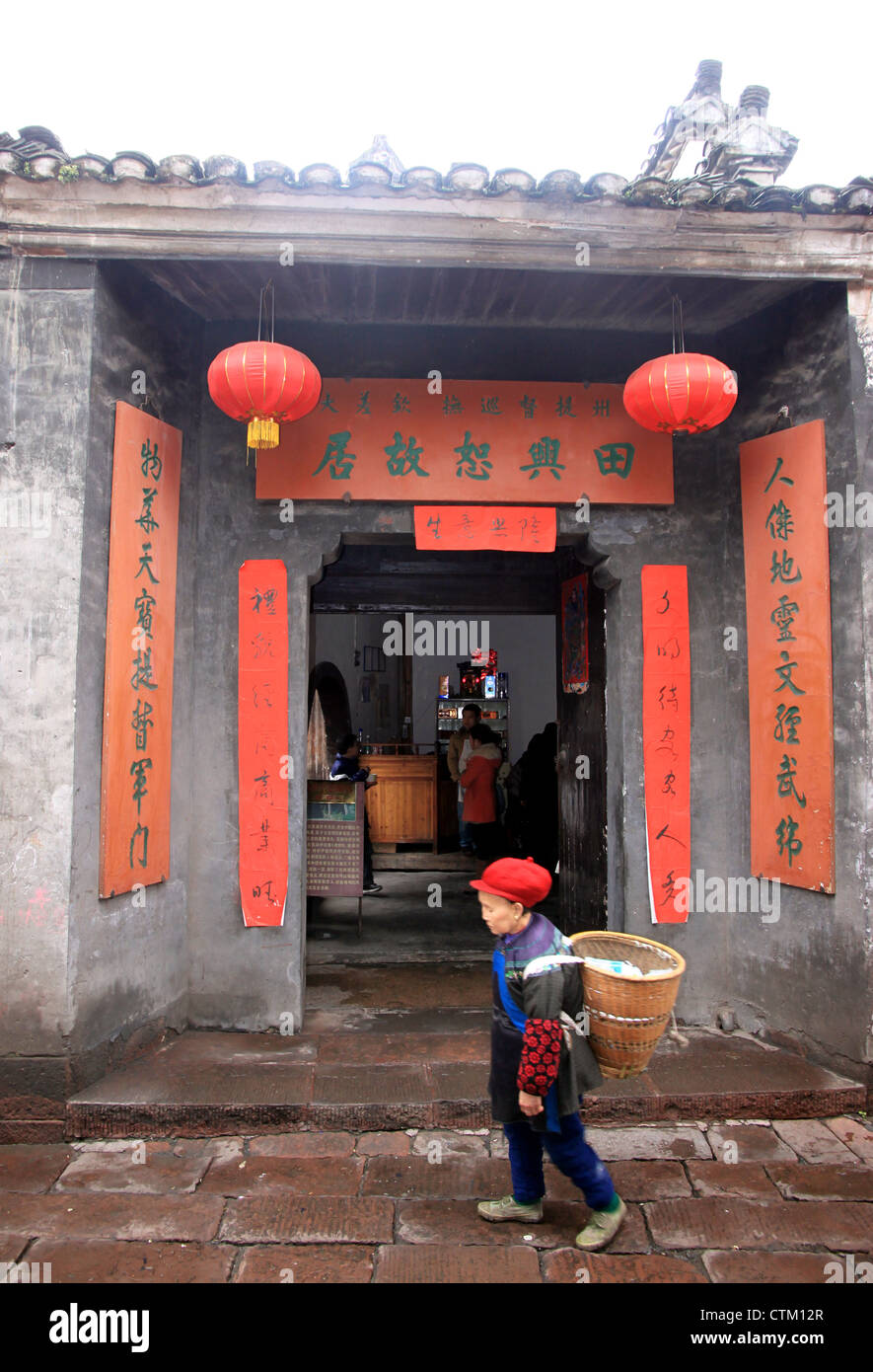 Chinese woman carrying chest on hi-res stock photography and images - Alamy