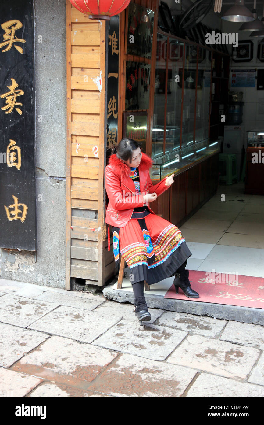 A street vendor woman in Fenghuang, China Stock Photo - Alamy