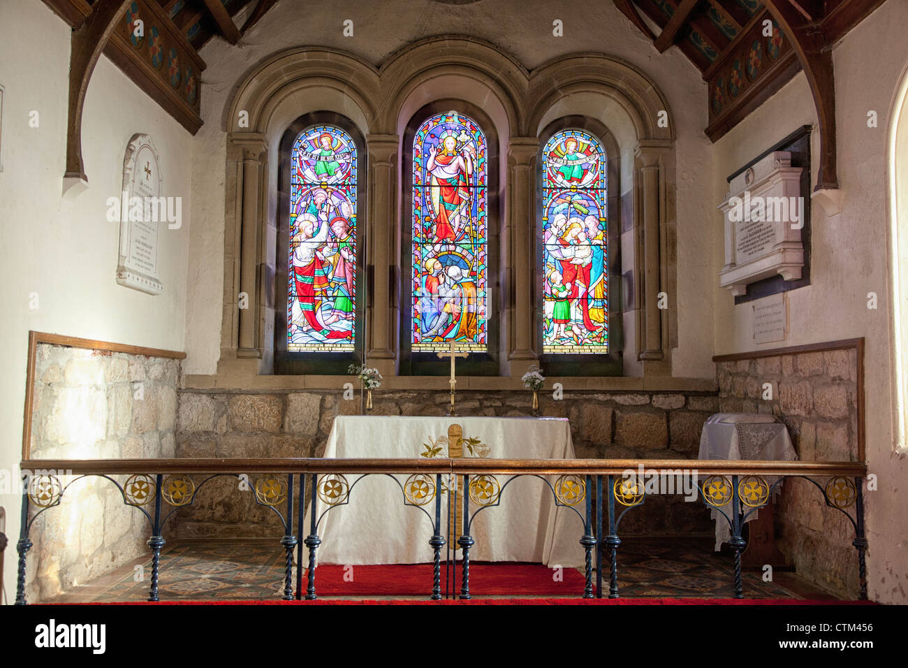 Stained Glass Windows At The Altar Of A Church; Northumberland, England ...