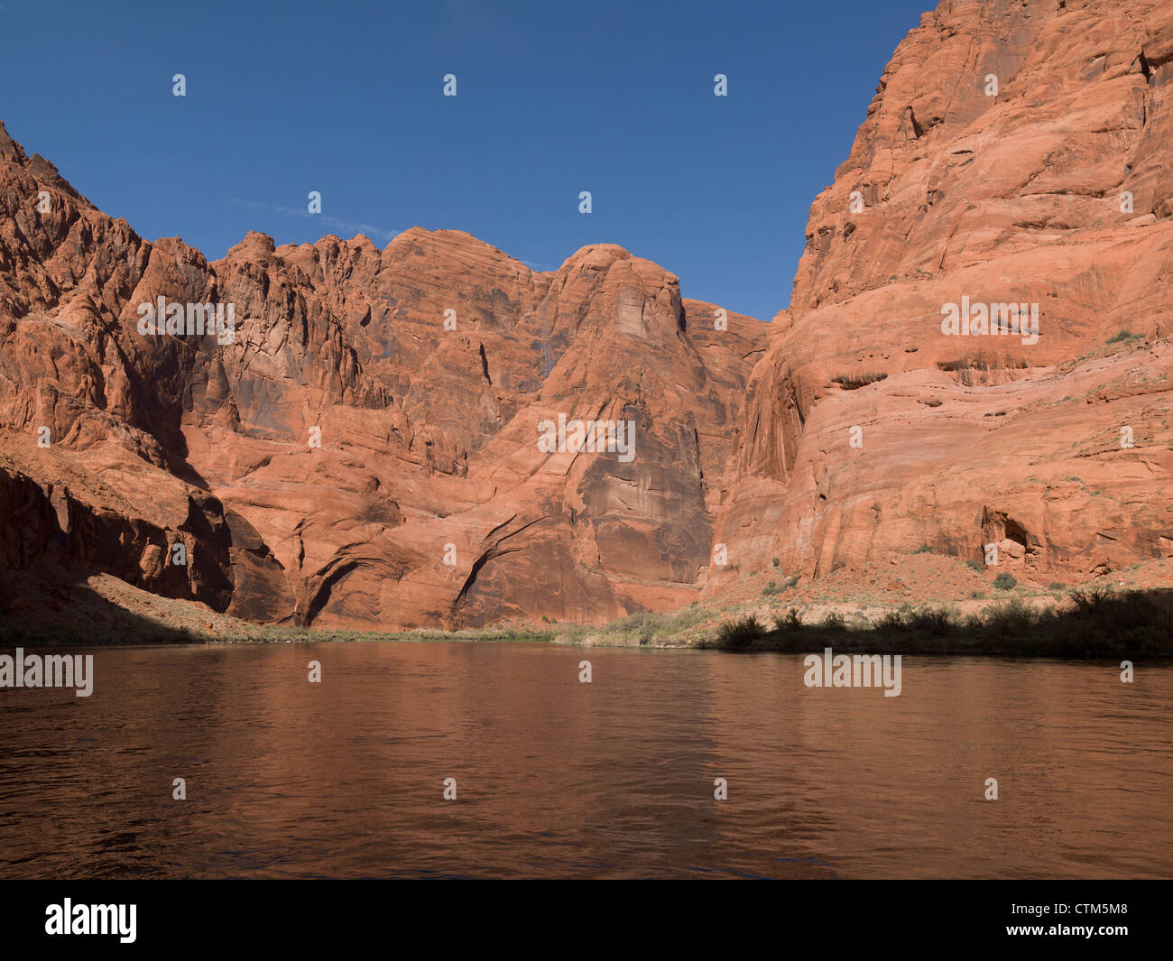 Rock Cliffs Along The Shoreline Of The Colorado River; Arizona, United ...