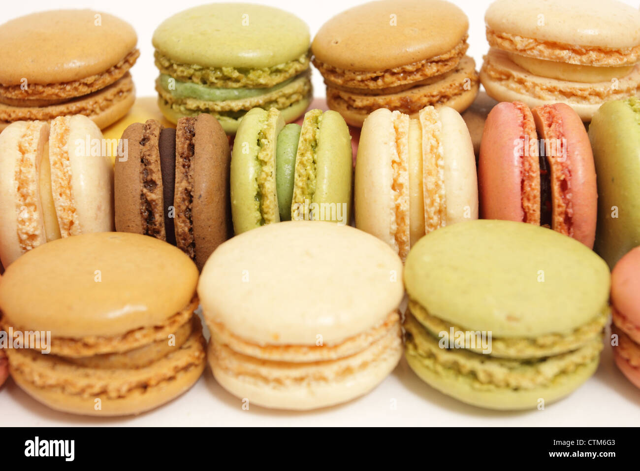 assortment of macaroons on a white background Stock Photo - Alamy