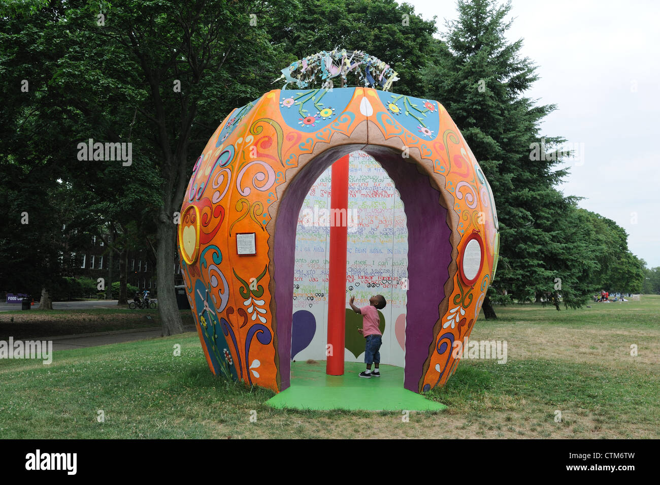A child inside a sculpture called "The Circle of Intention" on ...