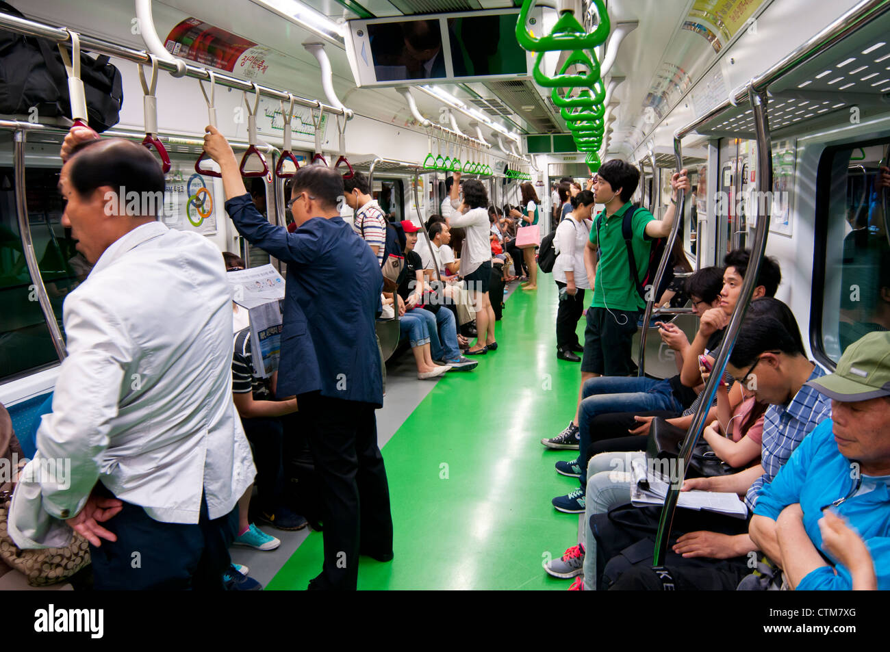 Passengers on subway train, Seoul, Korea Stock Photo - Alamy