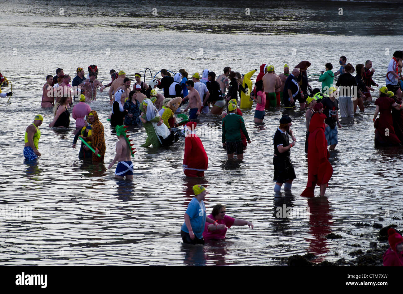 The Loony Dook, a New Year's Day event where people wade into the River ...