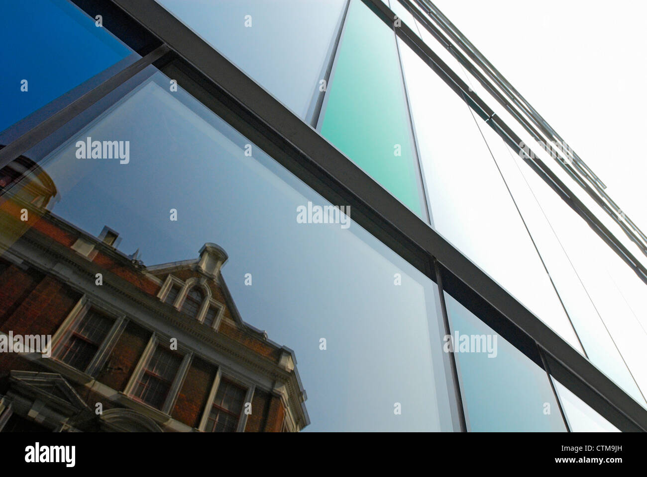 Abstract detail of office building with tinted glass cladding ...