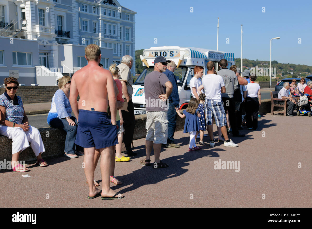 Ice cream queue on Hythe seafront Kent Stock Photo - Alamy