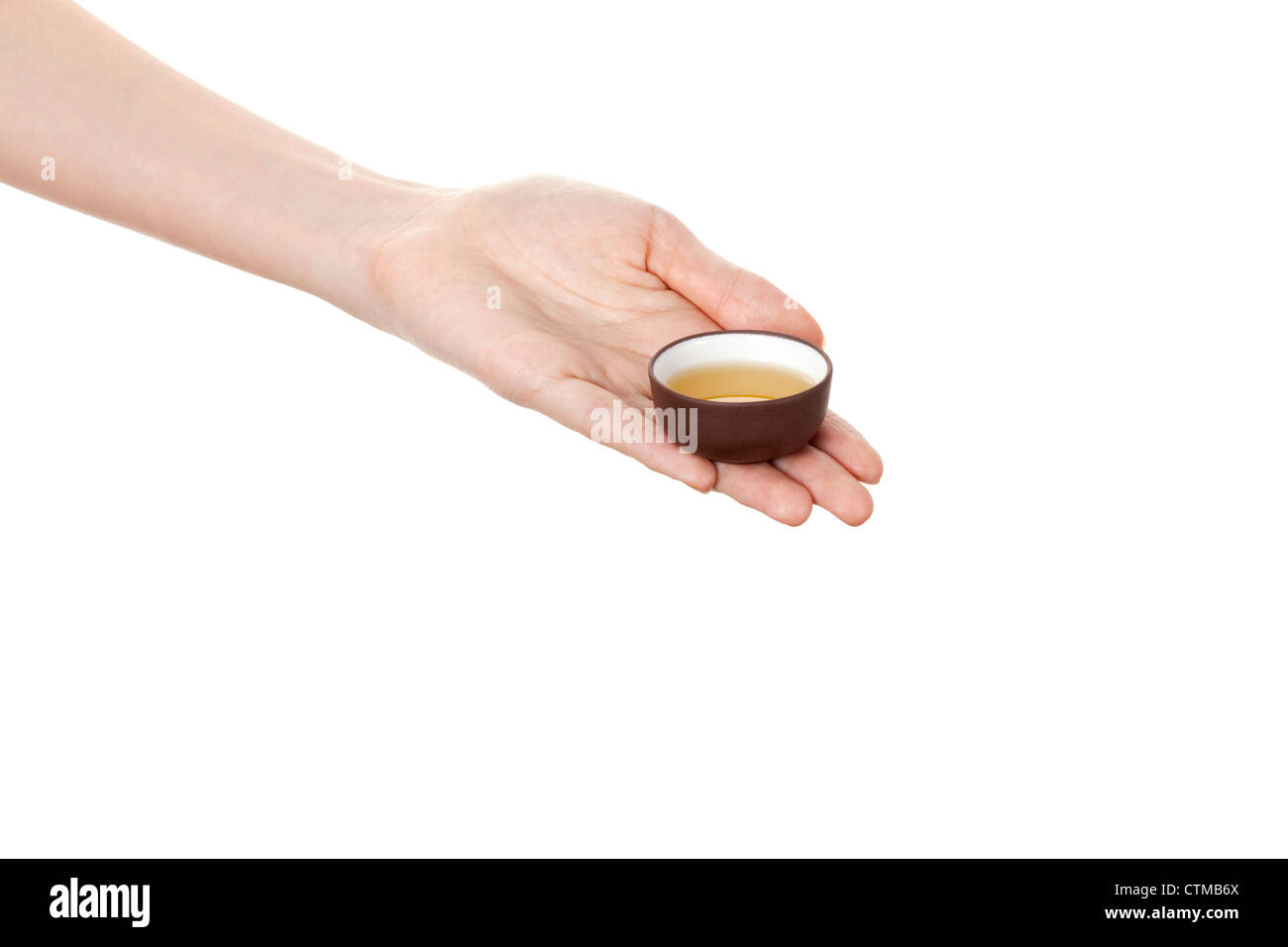 Tea in woman's hands Stock Photo - Alamy