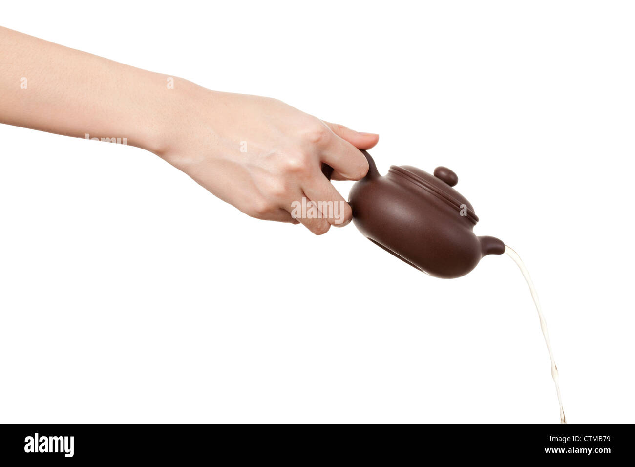 Tea pouring teapot Cut Out Stock Images & Pictures - Alamy