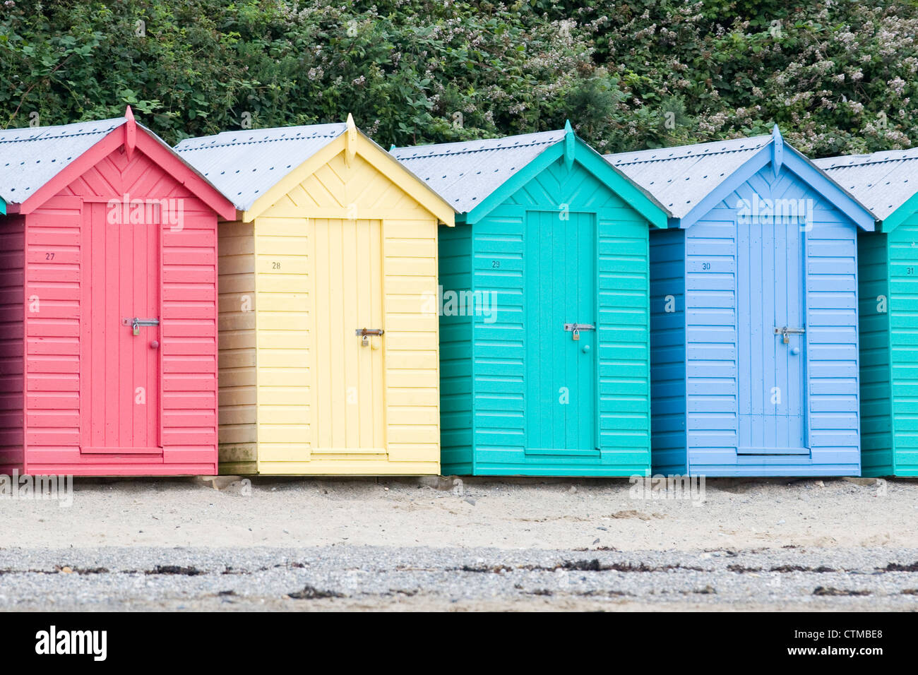 Colourful beach huts at a traditional British Beach Stock Photo - Alamy