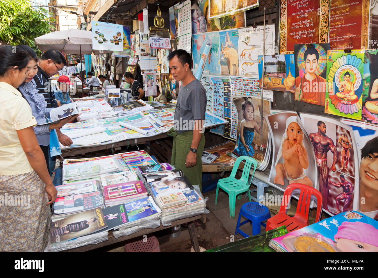 Street vendor with customers, Yangon, Myanmar Stock Photo - Alamy