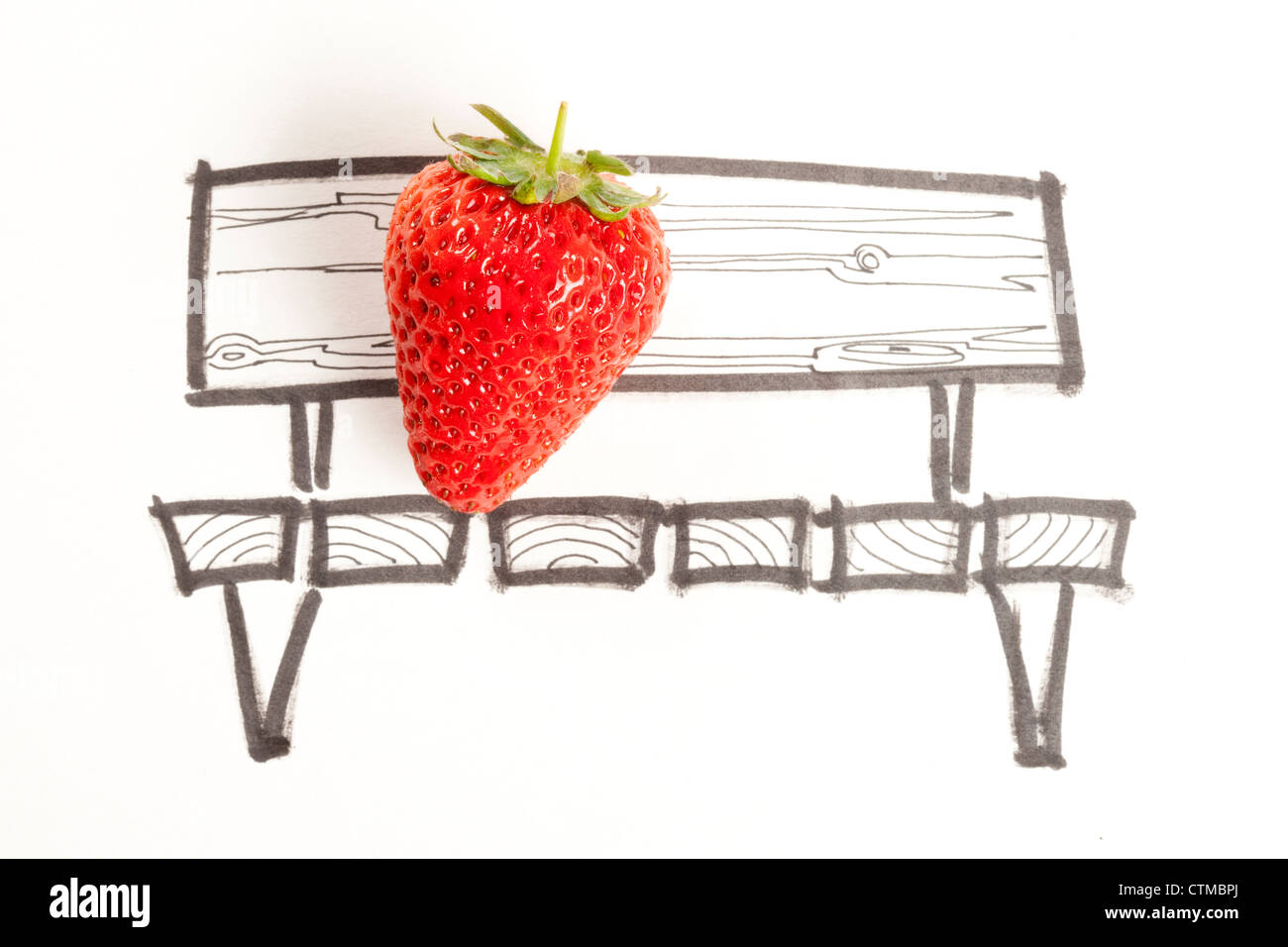 Strawberry on bench Stock Photo - Alamy