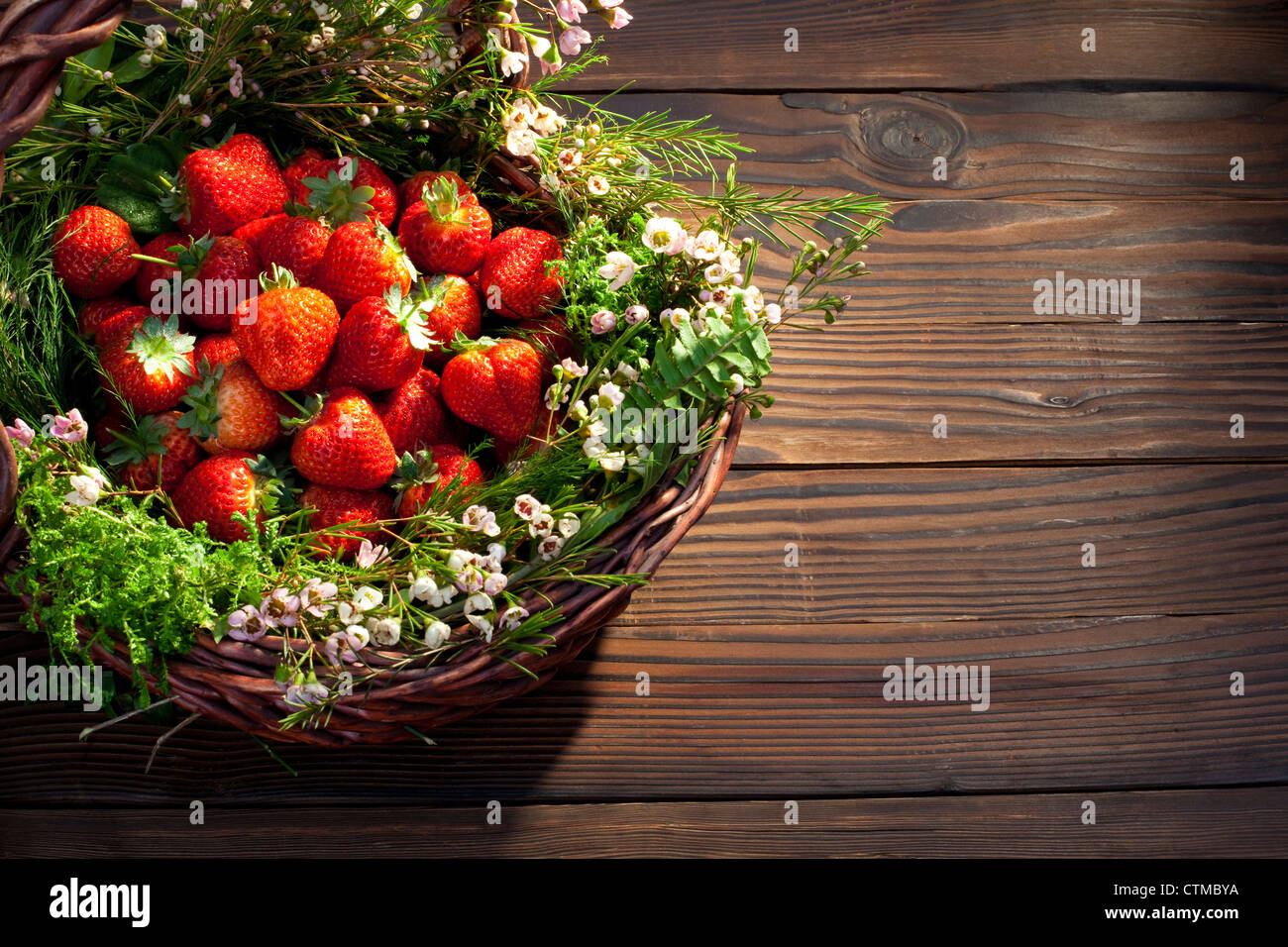 Strawberries in basket Stock Photo - Alamy