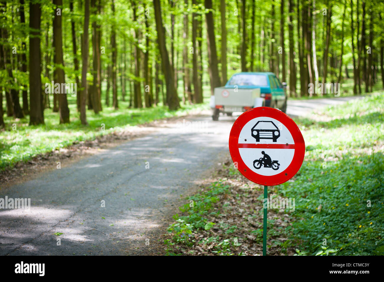 Breaking traffic rules concept: no motor vehicles sign at the edge of a ...