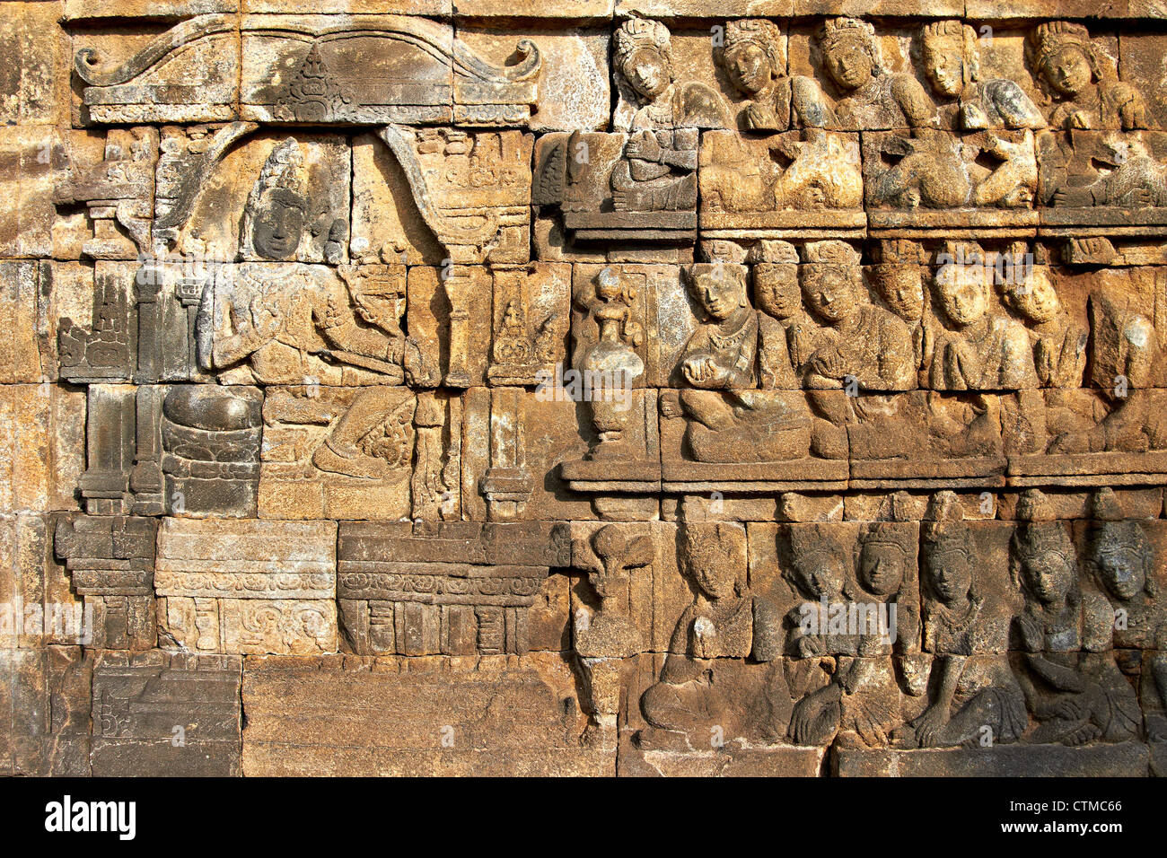 Bass-relief on the wall in Borobudur Buddhist temple, Indonesia, Java ...
