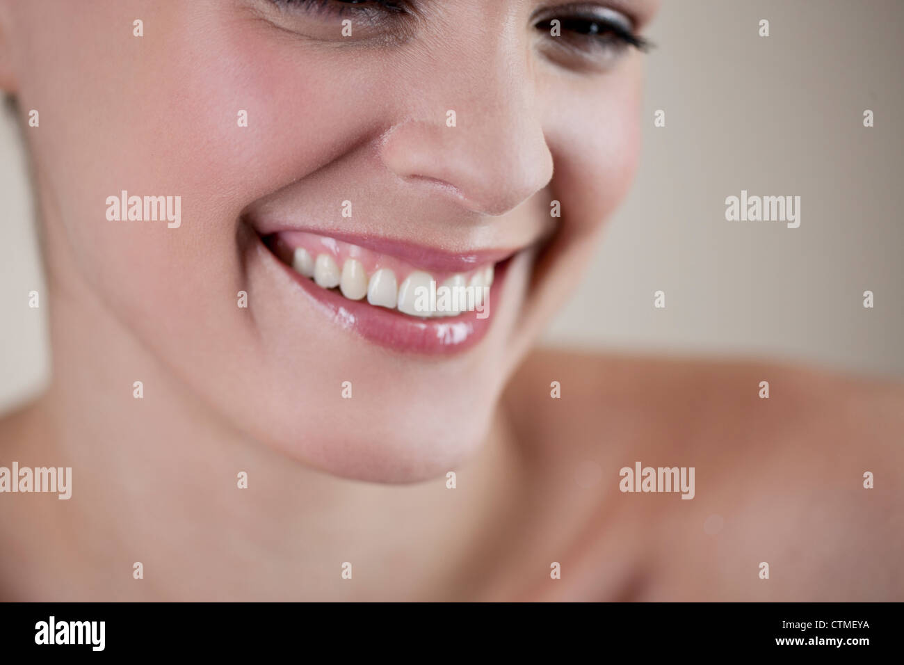 Close-up of a young woman laughing, three quarter view Stock Photo - Alamy