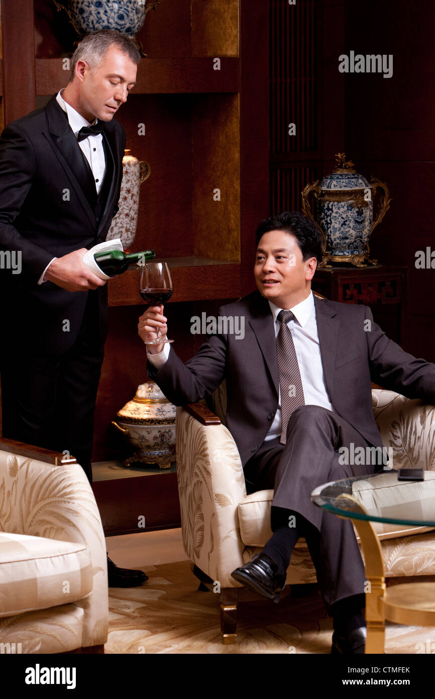 Professional service in club house Stock Photo - Alamy