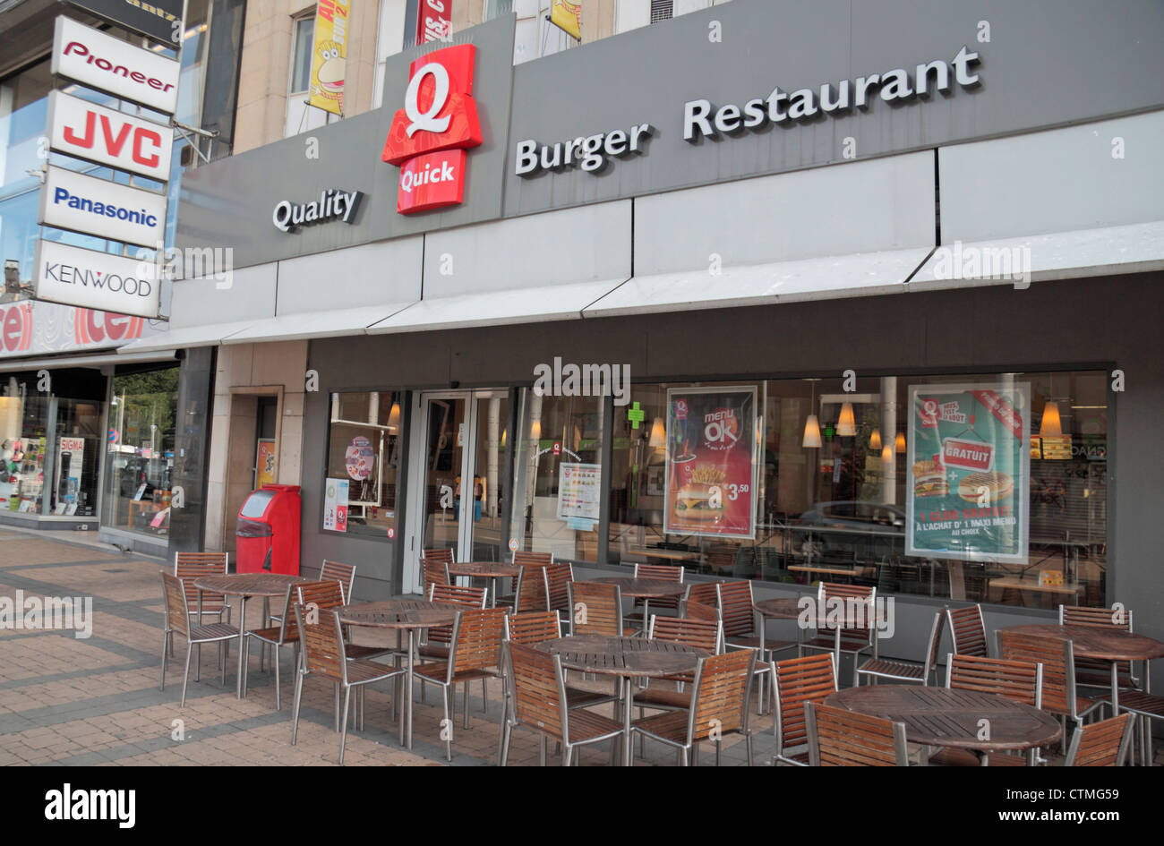 Empty tables outside a Belgian Quick burger restaurant in Charleroi ...