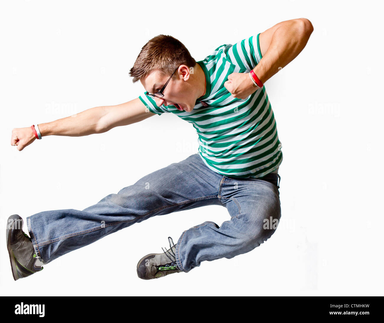 A Young Man Leaps In The Air Stock Photo - Alamy