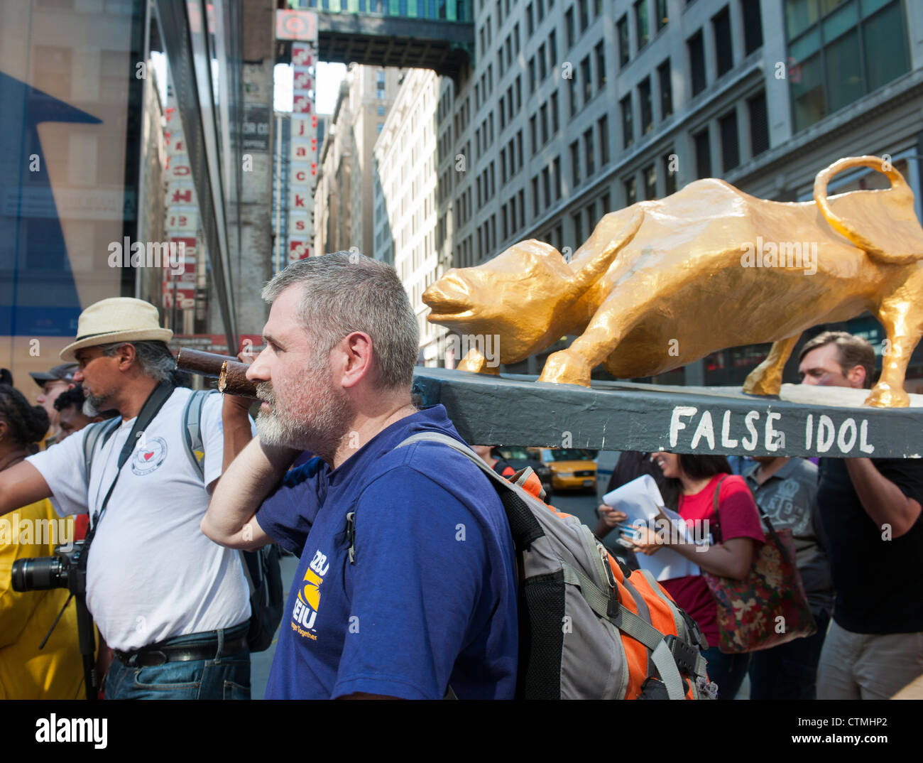 Hundreds of workers and supporters march in a demonstration for a ...