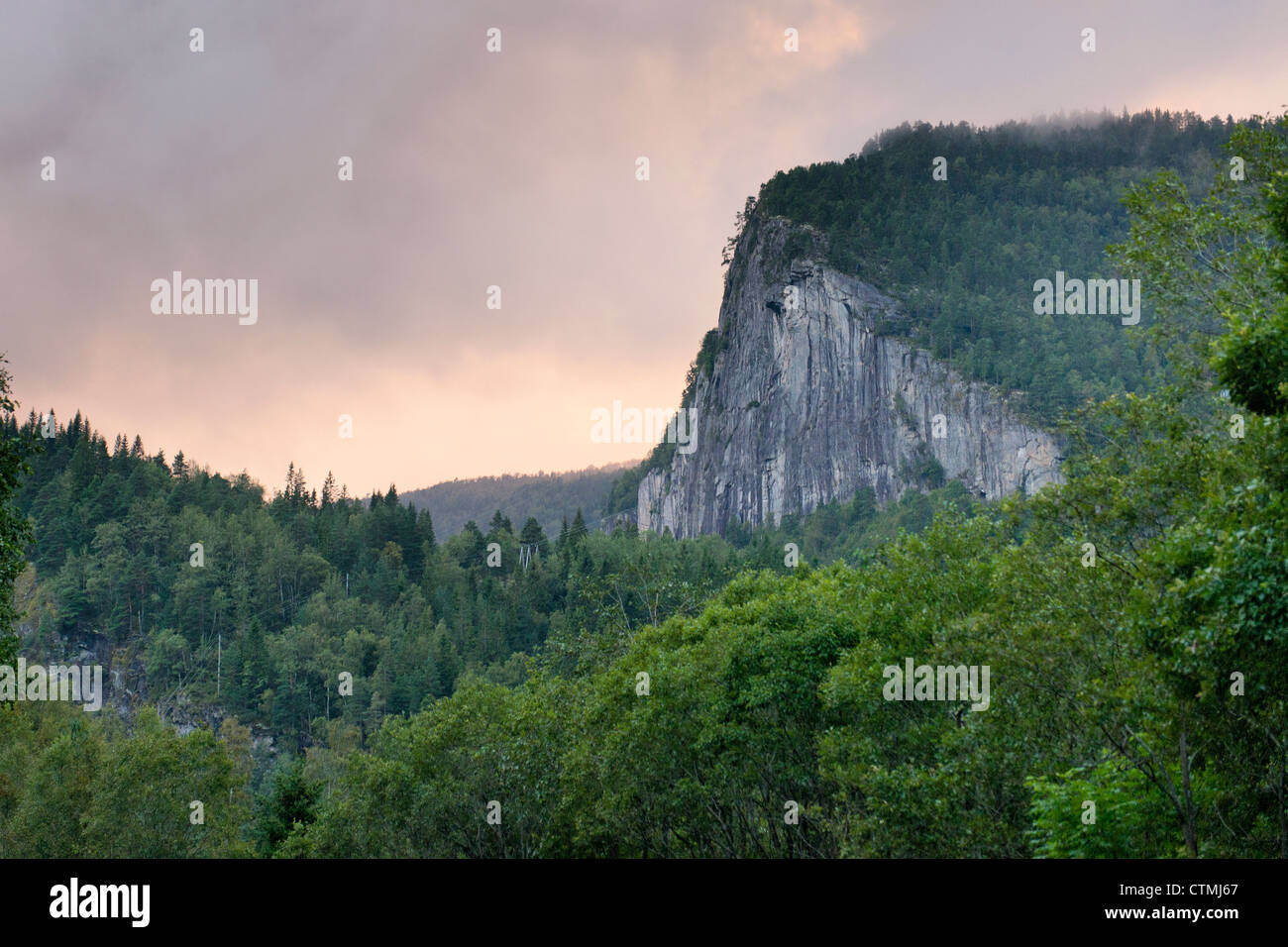 Clouds At Sunset And A Cliff With Trees; Norway Stock Photo - Alamy