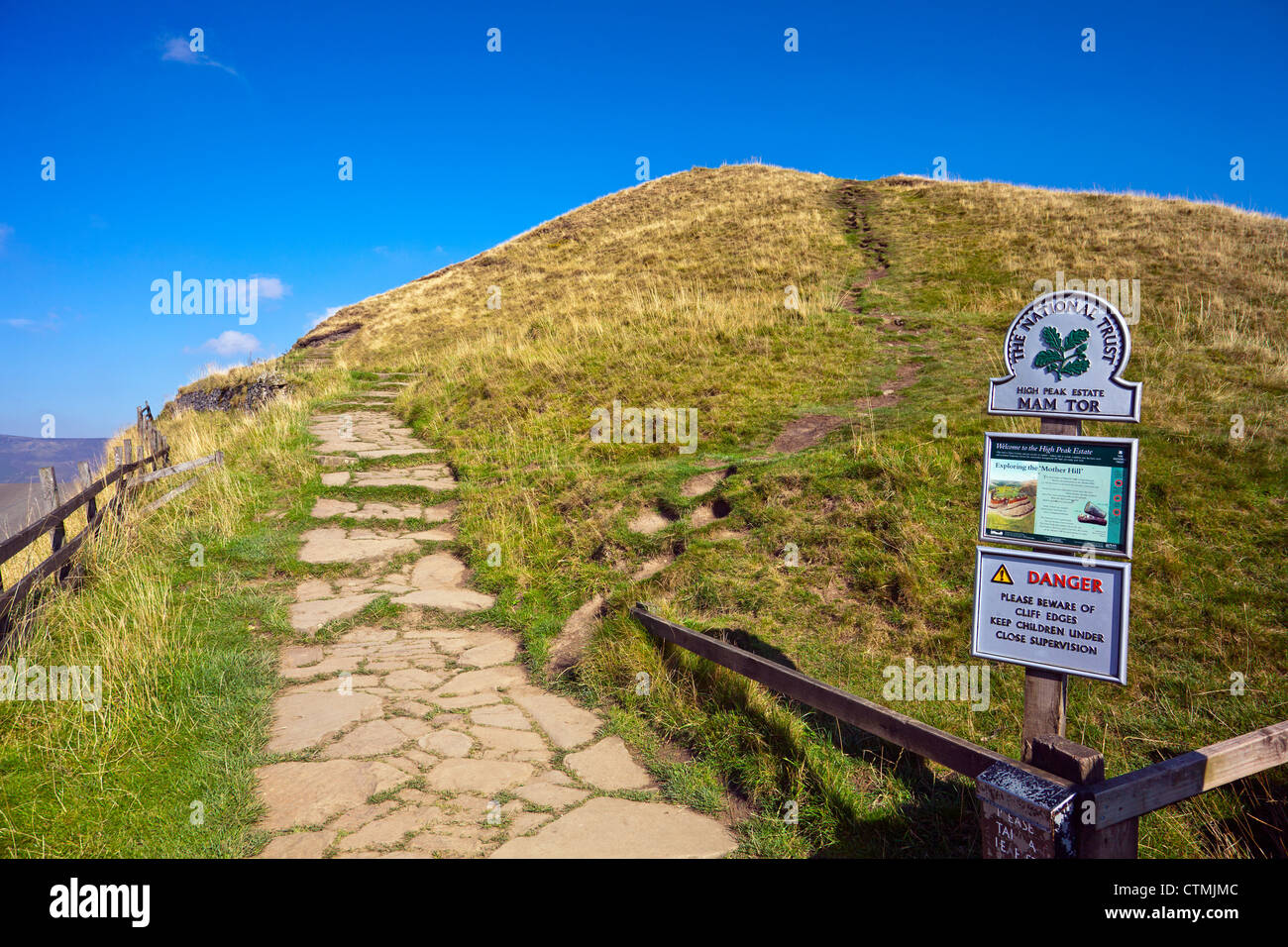 National Trust sign on the path to Mam Tor summit in the Peak District ...