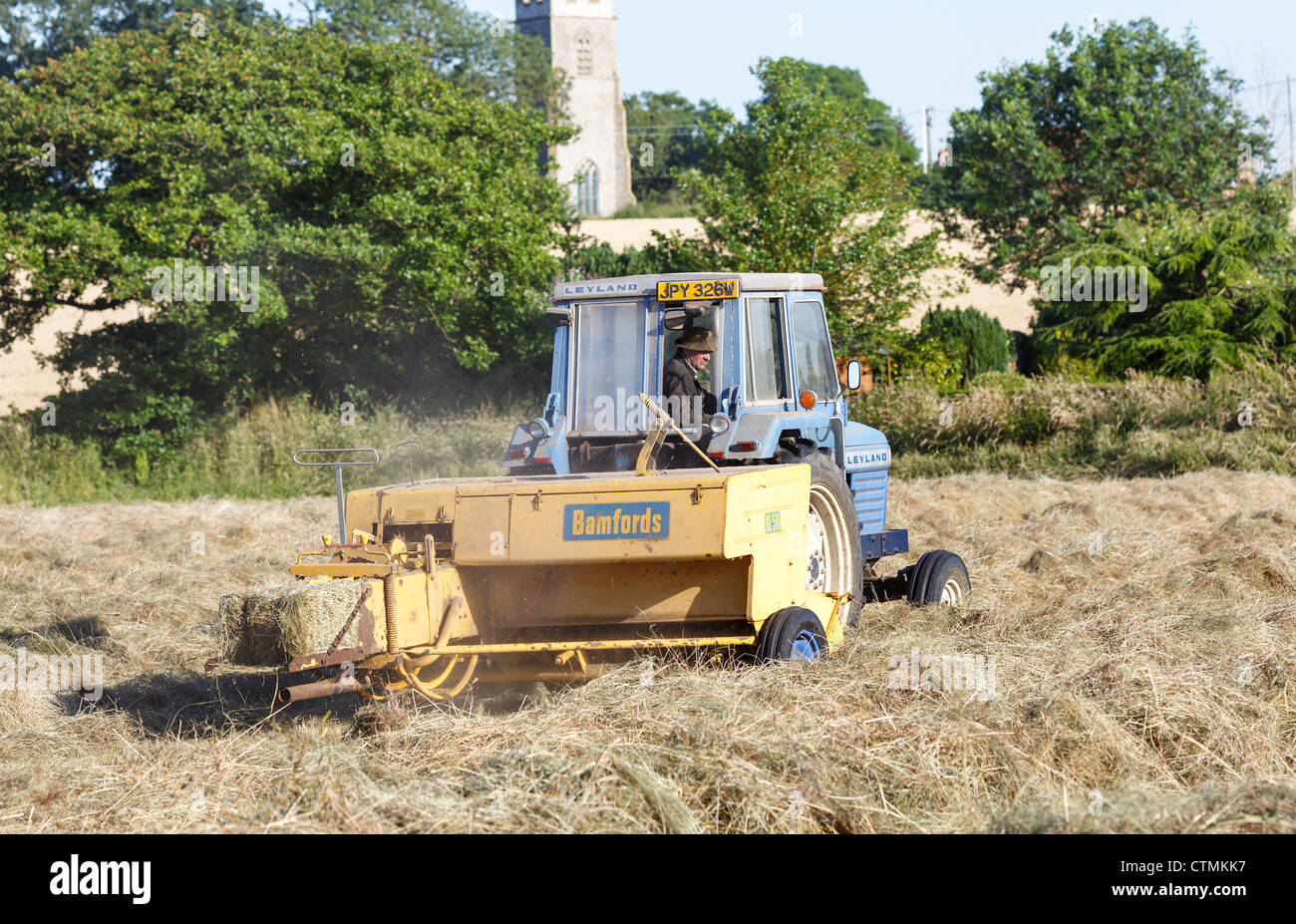 Farmers making hay while the sun shines in the beautiful open "British Countryside" "North ...