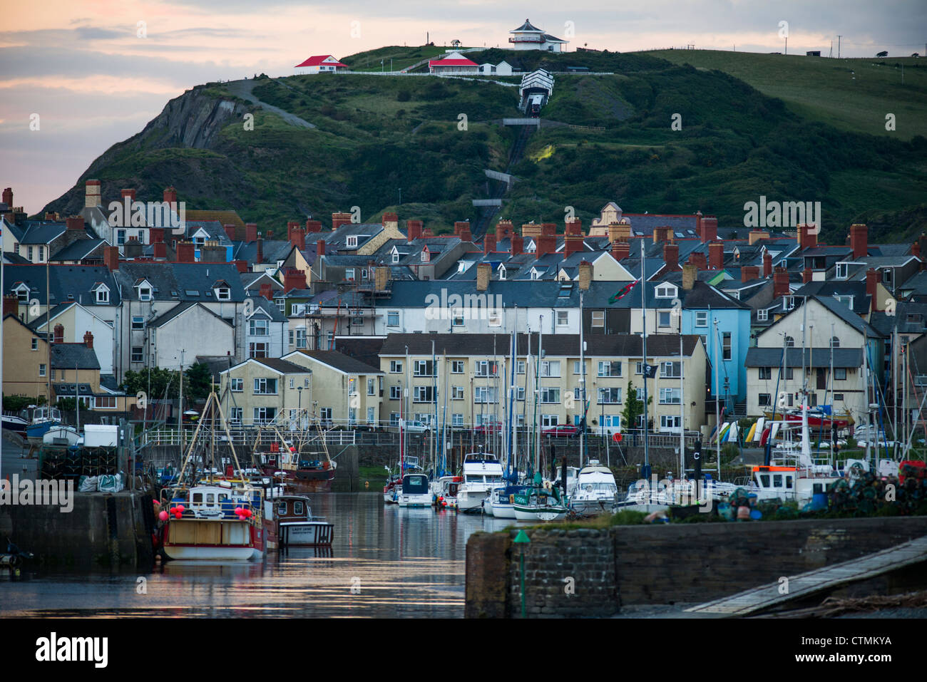 The harbour marina at high tide after sundown,Aberystwyth Ceredigion ...