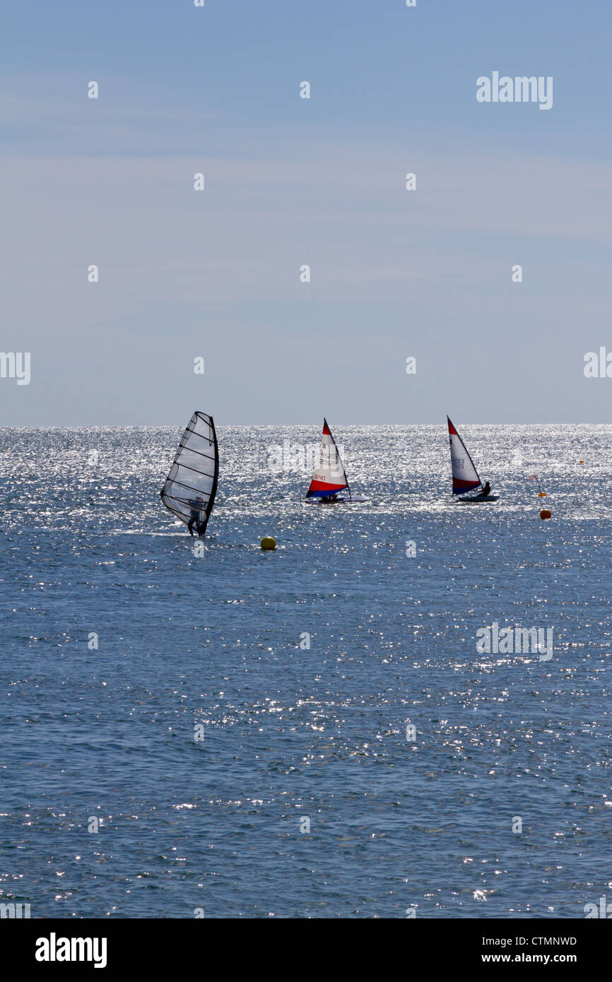 Sailboarding on a shimmering sea at Aberdyfi, north Wales Stock Photo ...