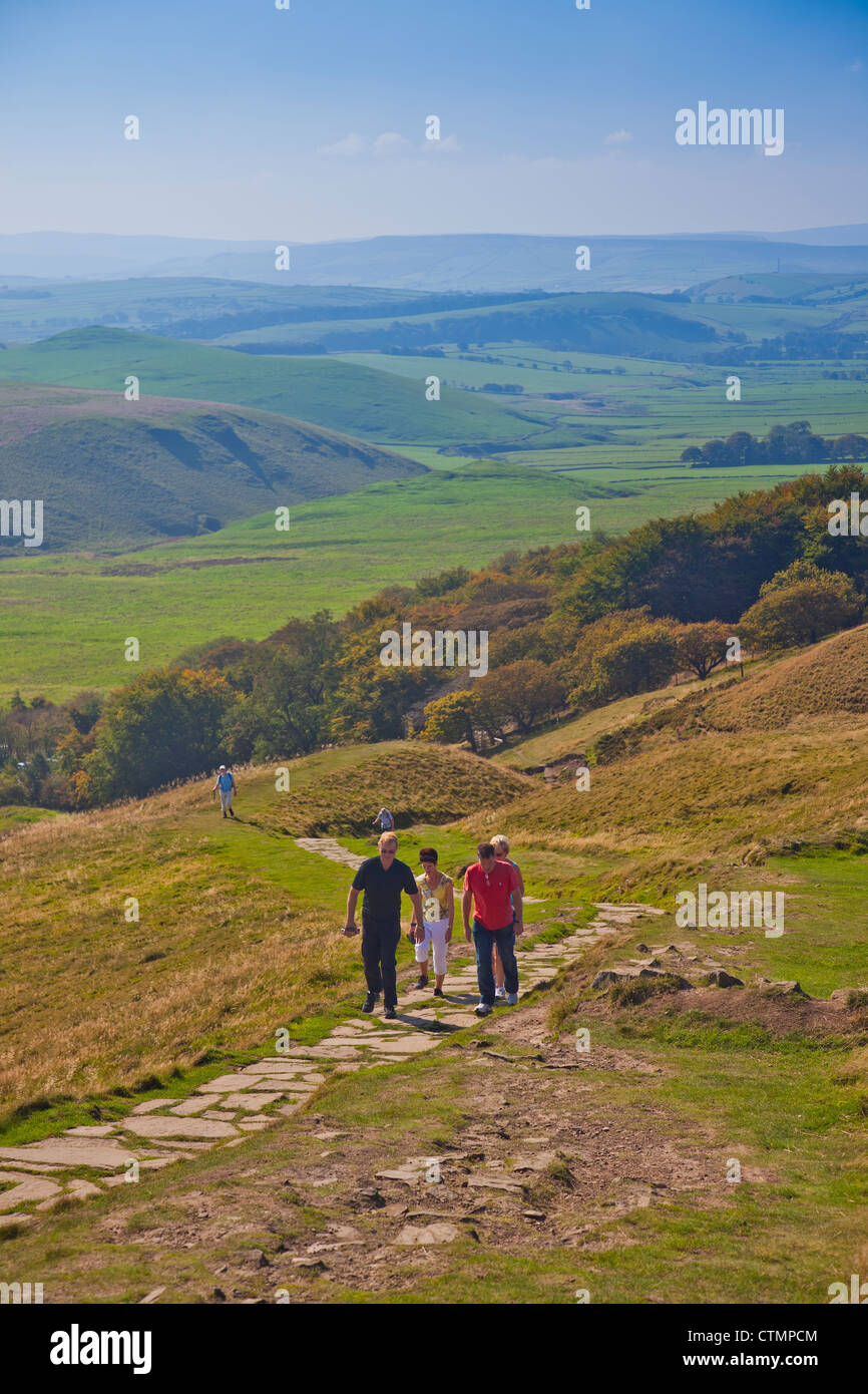 Walkers on the path to the summit of Mam Tor in the Peak District ...