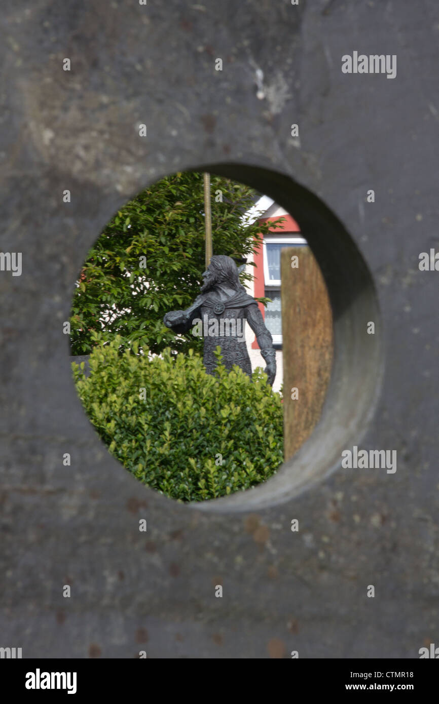 Owain Glyndŵr statue at Pennal near Machynlleth seen through a circular ...