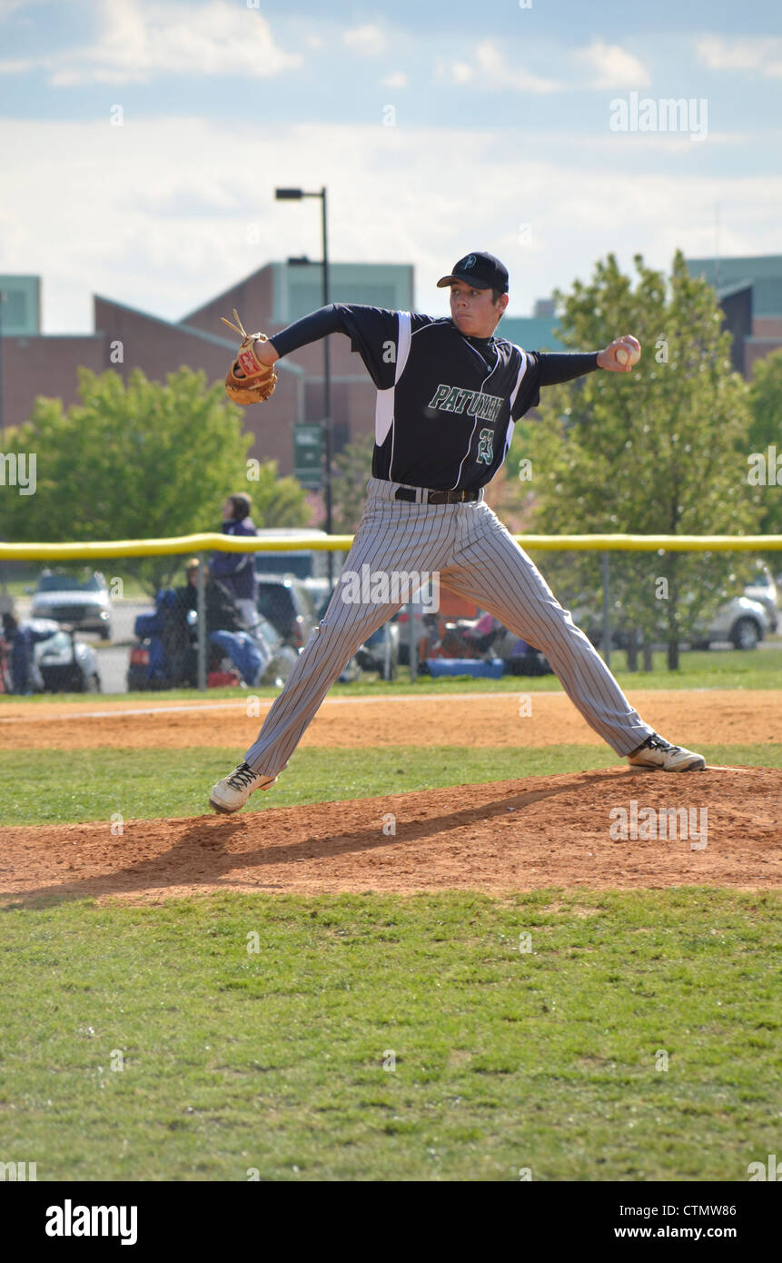 Pitcher at a high school baseball game Stock Photo - Alamy