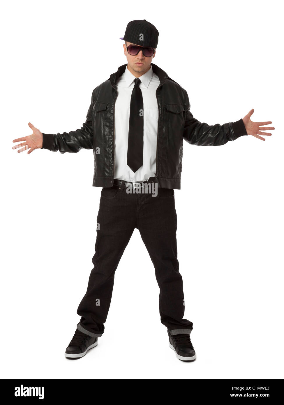 Full length studio photo of trendy young hip hop guy standing on white ...