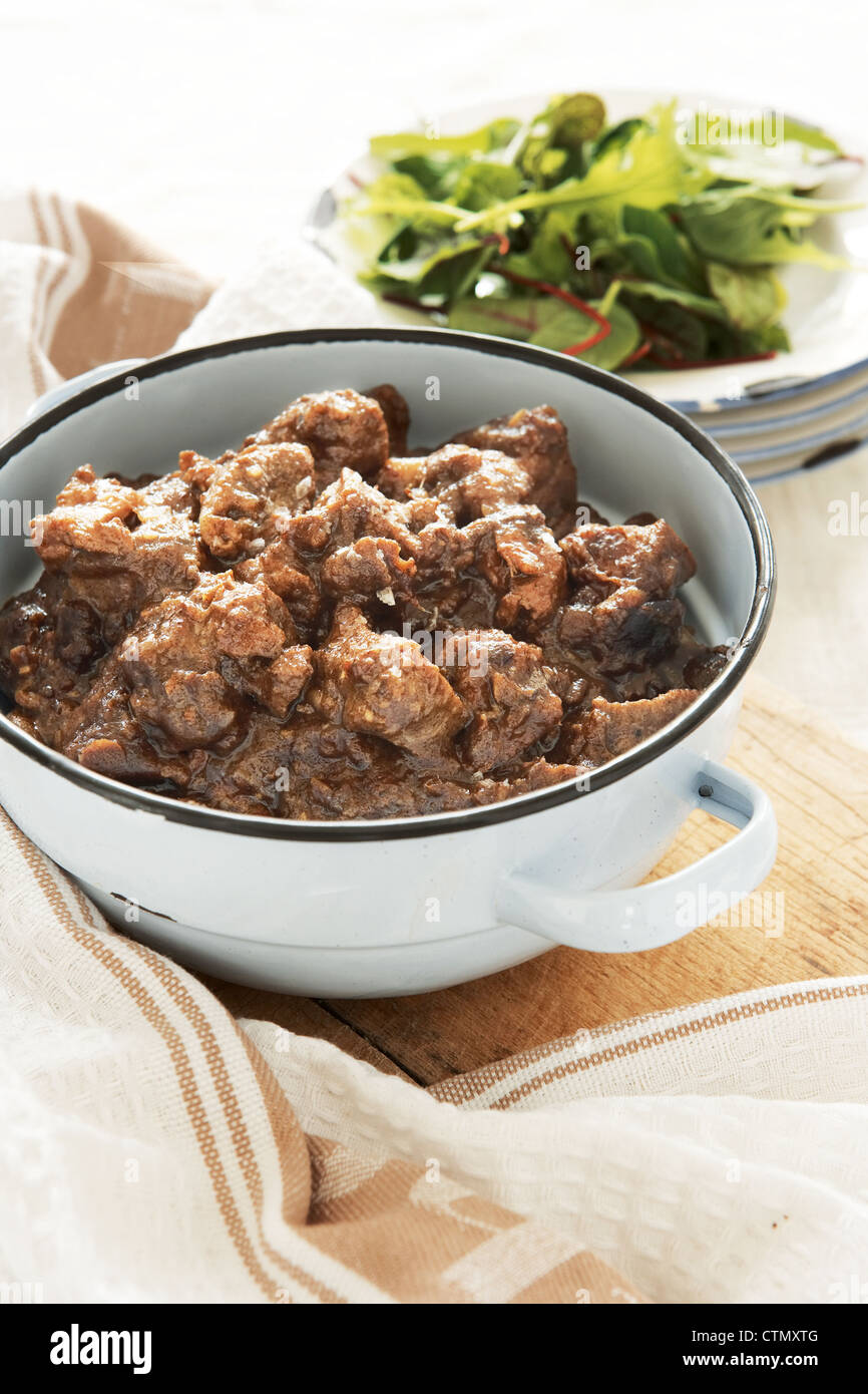 Traditional Karoo cooking. Lamb with dates and honey Stock Photo - Alamy