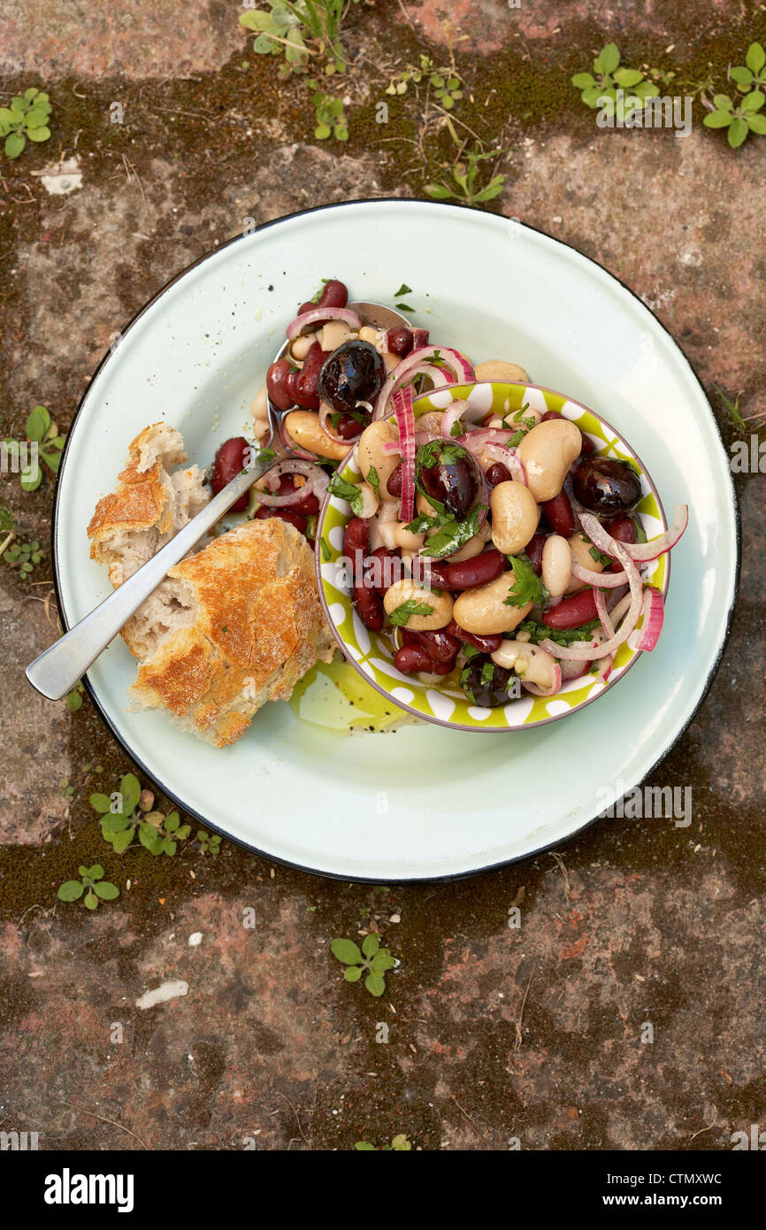Traditional African cooking. Three-bean salad with olives. Ingredients ...