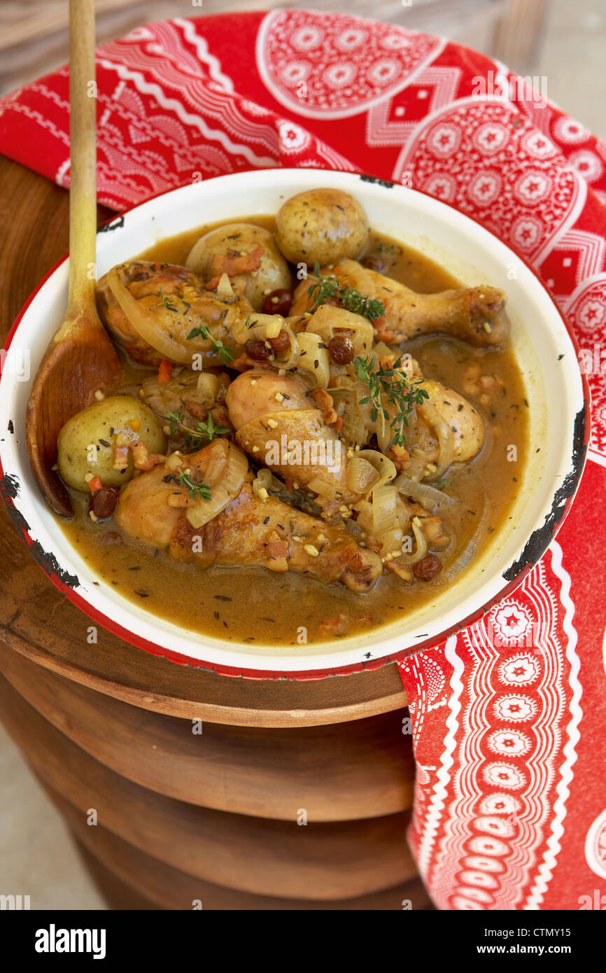 Traditional African cooking. Chicken with port and raisins. Ingredients ...