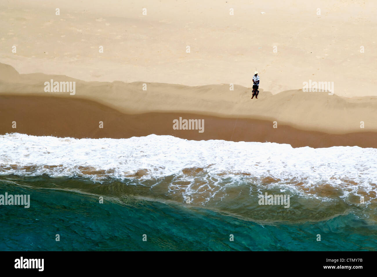 Man fishing on beach, Sodwana Bay, Kwa Zulu Natal, South Africa Stock ...