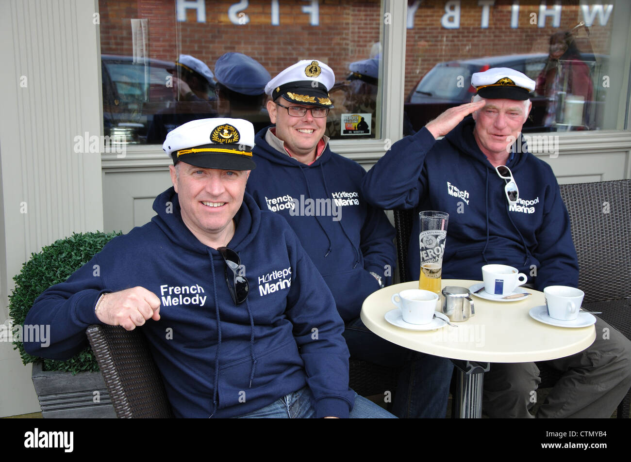 boat crew relaxing on shore leave, Whitby, Yorkshire, England, UK Stock ...