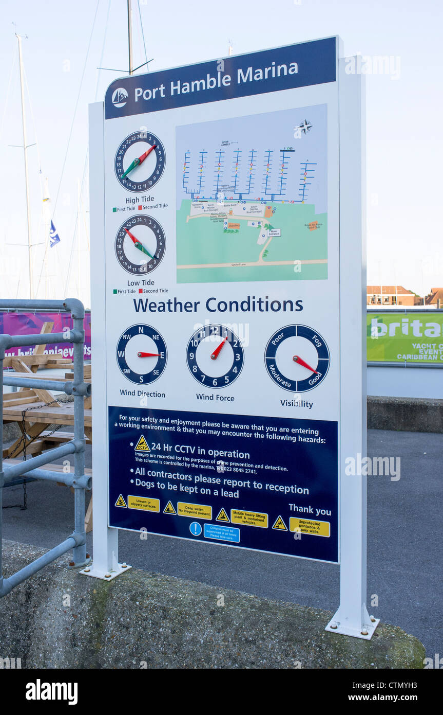 Port Hamble Marina information board giving times of tide and weather ...