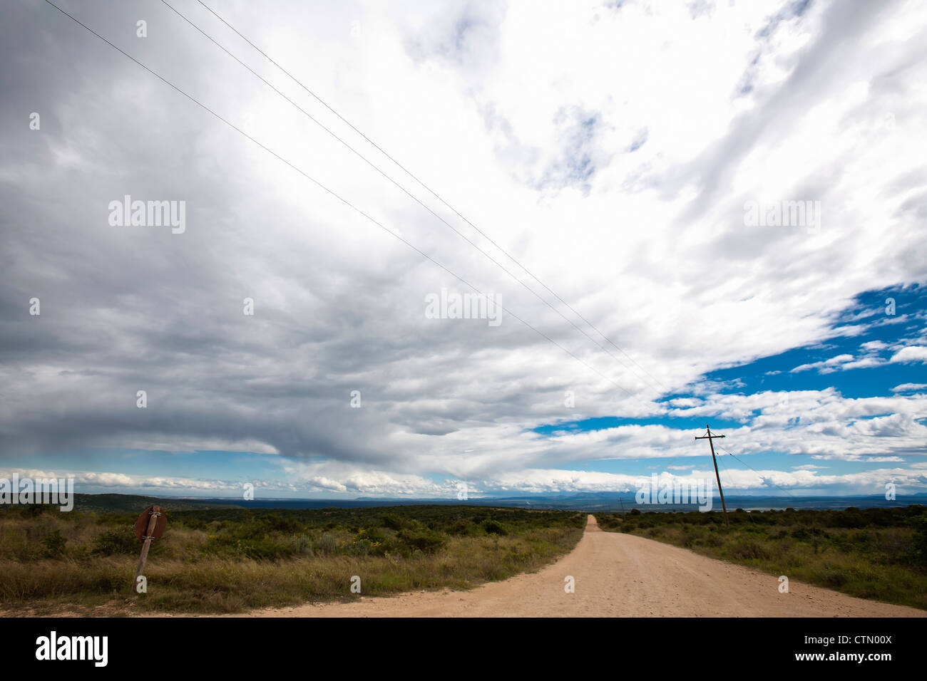 Landscape with dusty road and cloud formation, Addo Elephant National ...