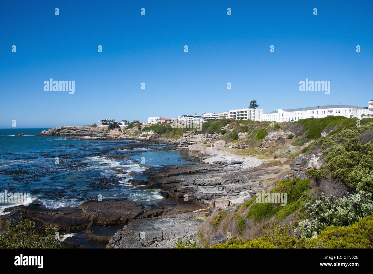 The Marine Tidal Swimming pool lies between rocks in the sea below the ...
