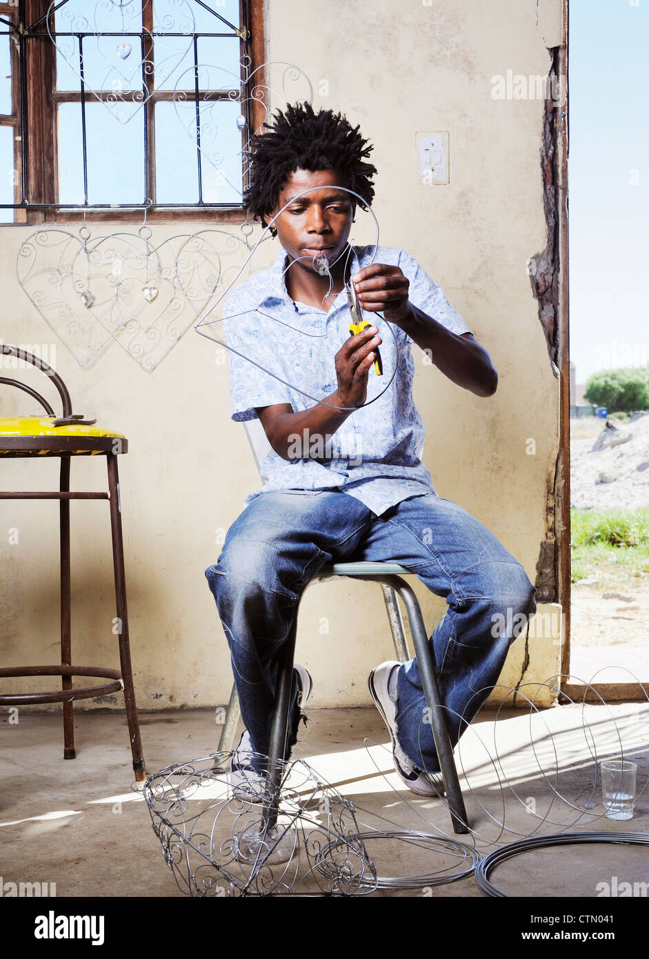 African man making effort hi-res stock photography and images - Alamy